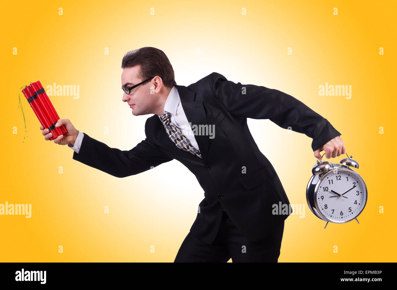 Man with time bomb isolated on white Stock Photo - Alamy