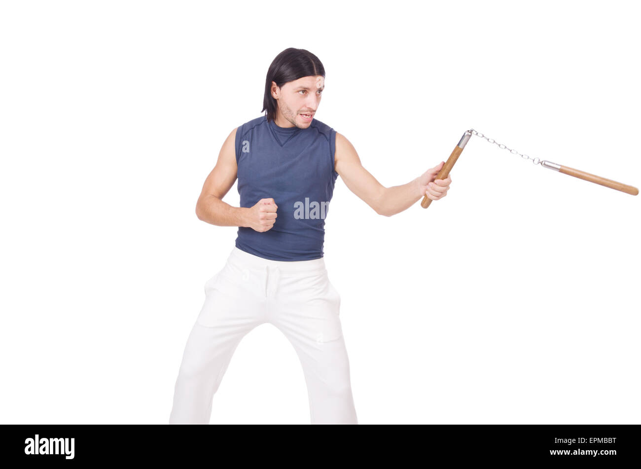 Funny karate fighter with nunchucks on white Stock Photo - Alamy