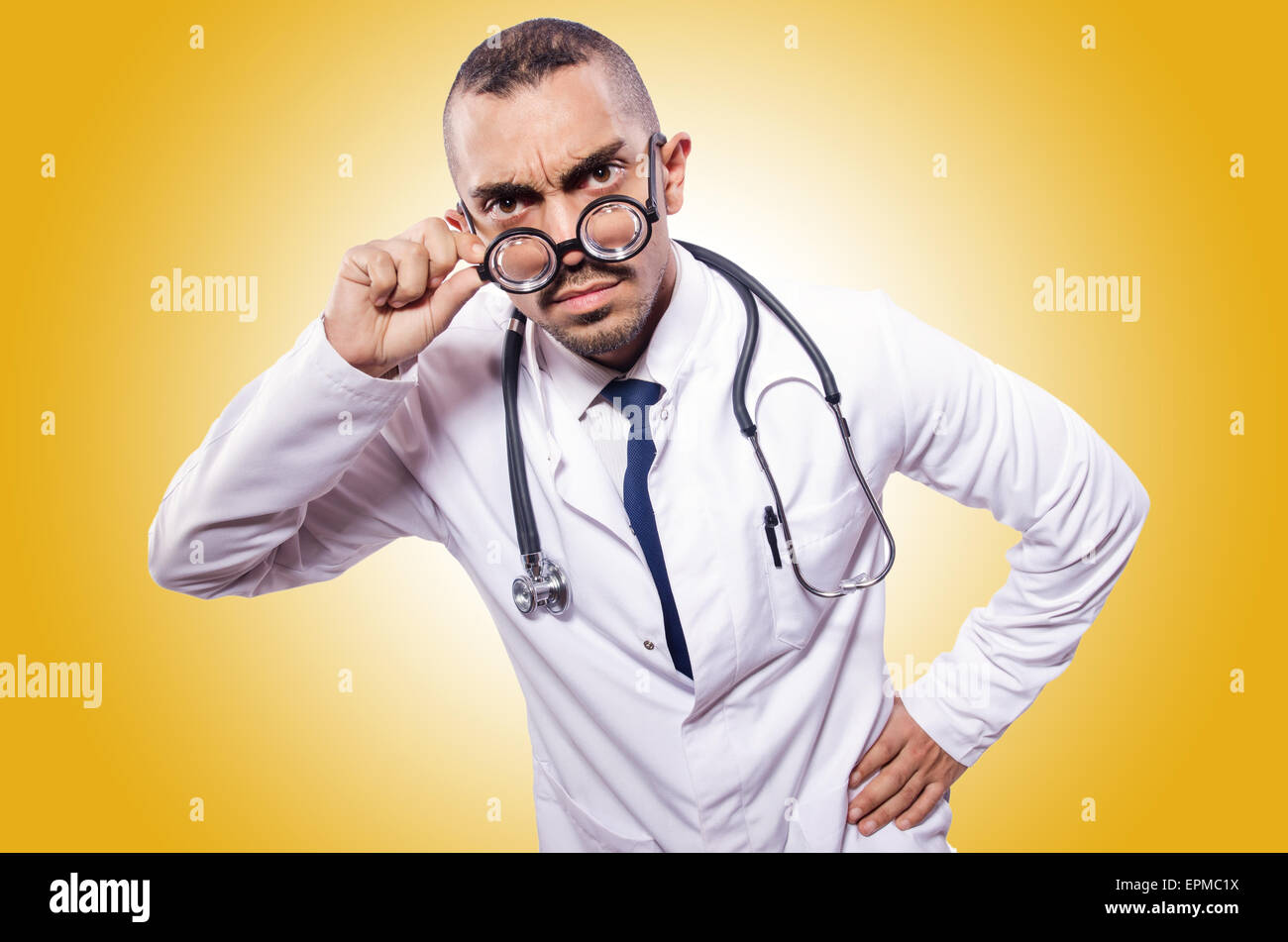 Funny doctor isolated on the white Stock Photo - Alamy