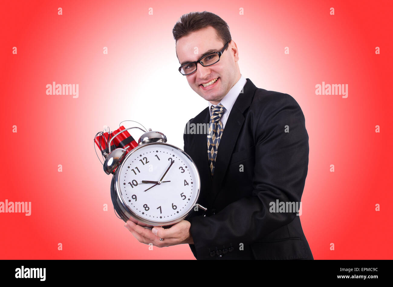 Man with time bomb isolated on white Stock Photo - Alamy