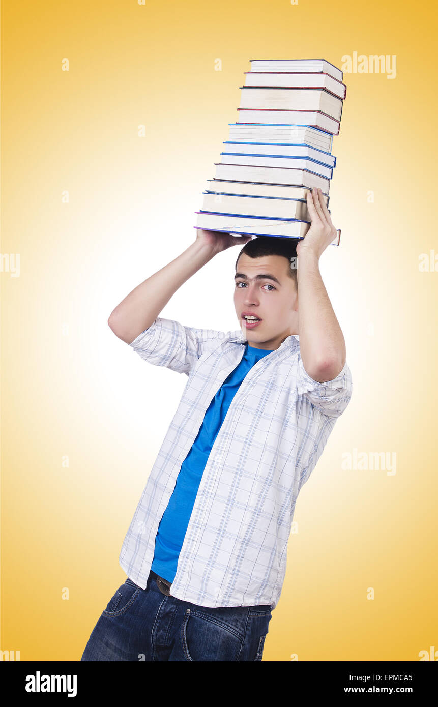 Student with lots of books on white Stock Photo - Alamy