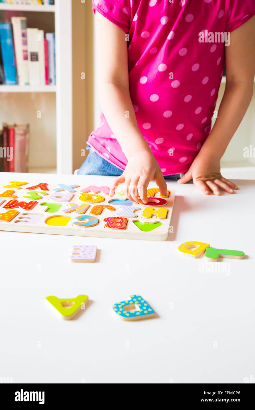 Child hand writing letters learning hi-res stock photography and images ...