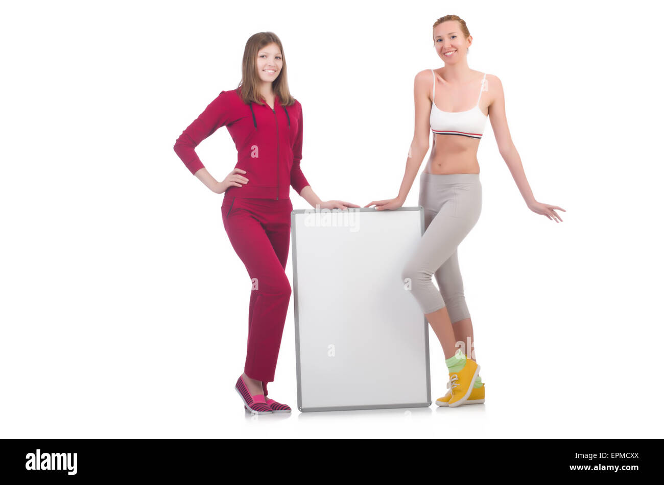 Girls in sport costumes isolated on white Stock Photo - Alamy