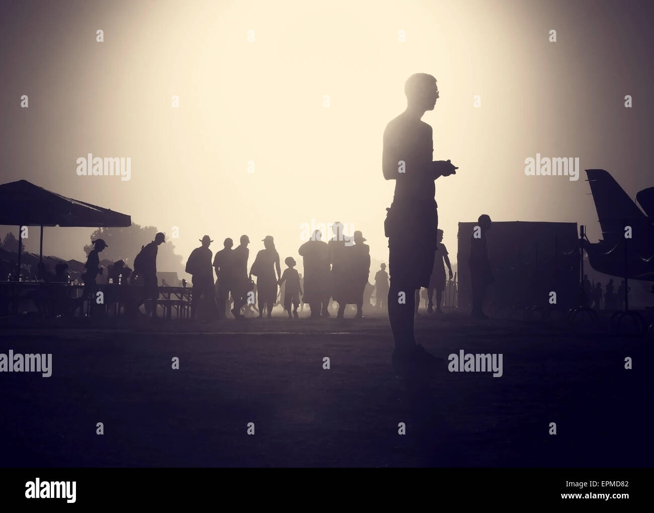 Lots of people in the dust Stock Photo - Alamy