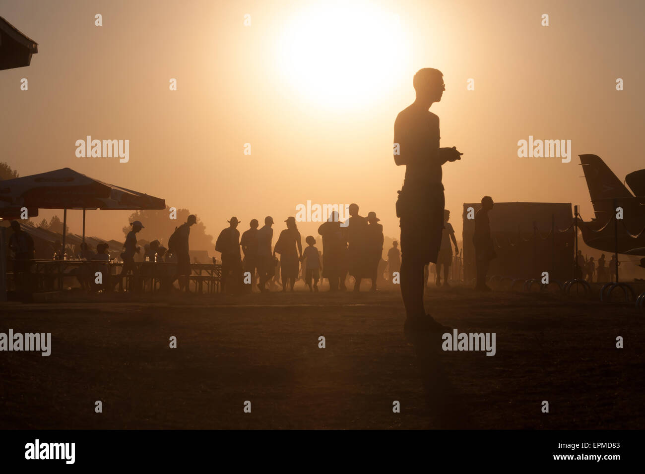 Lots of people in the dust Stock Photo - Alamy