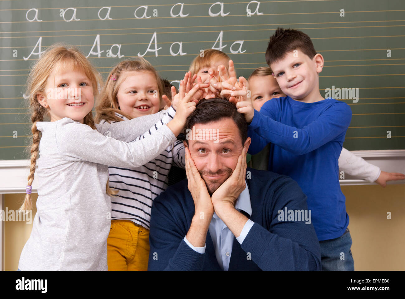 Grade 4 teacher hi-res stock photography and images - Alamy