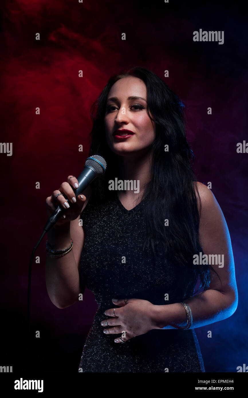 Beautiful woman singer performing hi-res stock photography and images ...