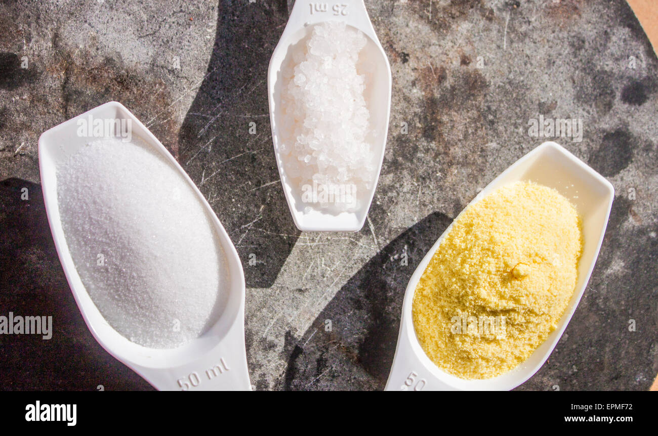 Yellow aroma-, transparent rock and ordinary white salt Stock Photo - Alamy