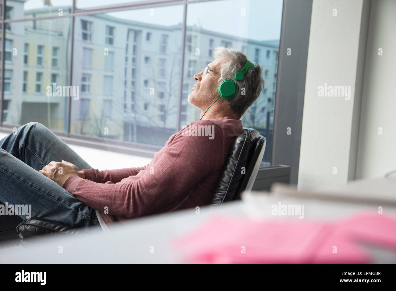 Back of leather armchair hi-res stock photography and images - Alamy