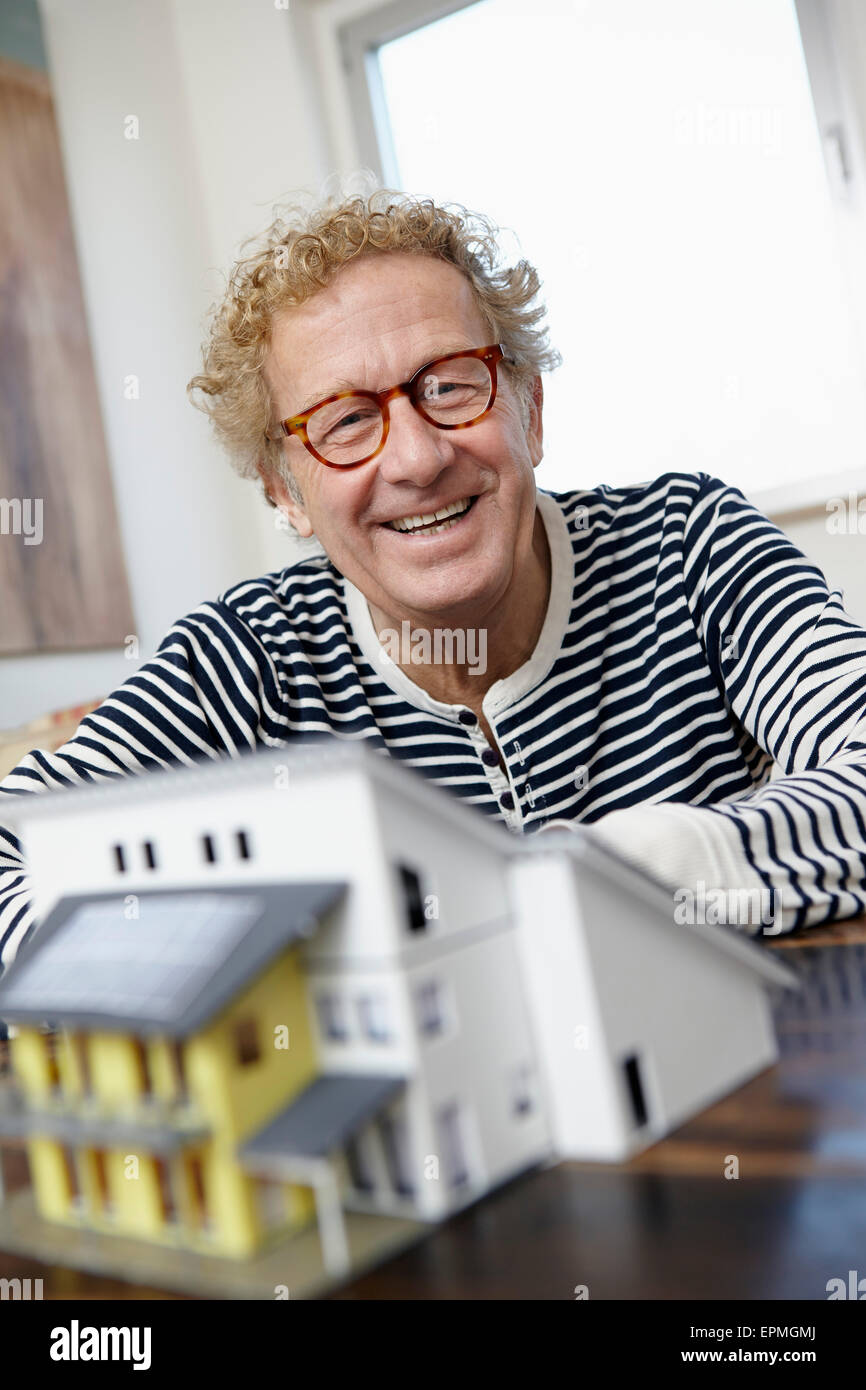 Senior man planning residential building Stock Photo - Alamy