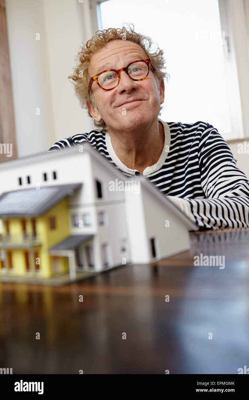 Senior man planning residential building Stock Photo - Alamy