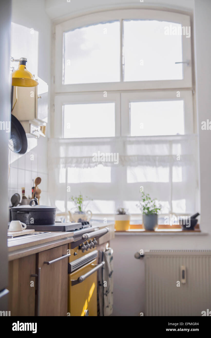 Interior of a kitchen in sunlight Stock Photo - Alamy