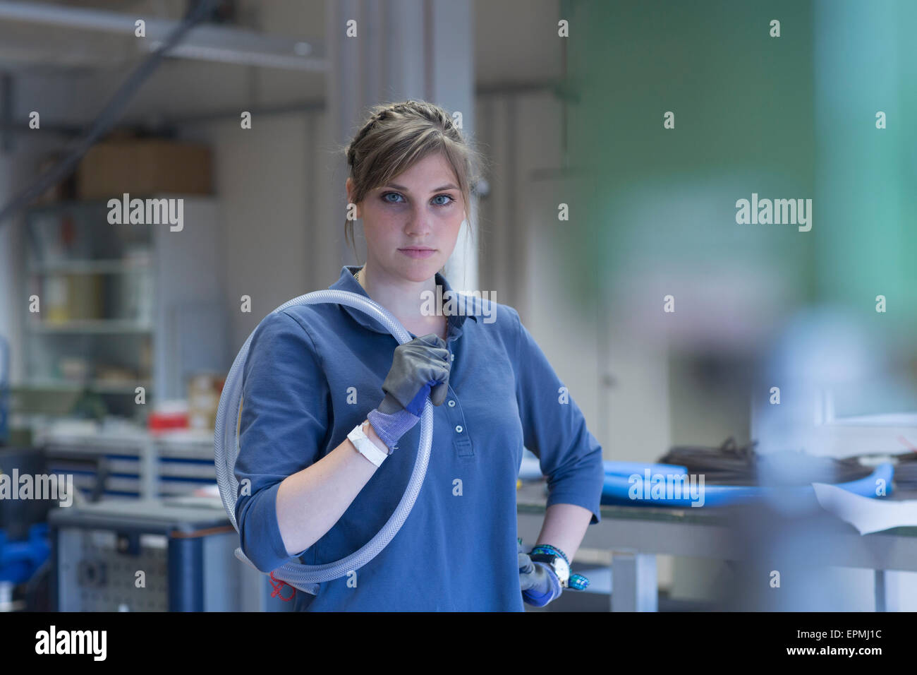 Carrying hose hi-res stock photography and images - Alamy