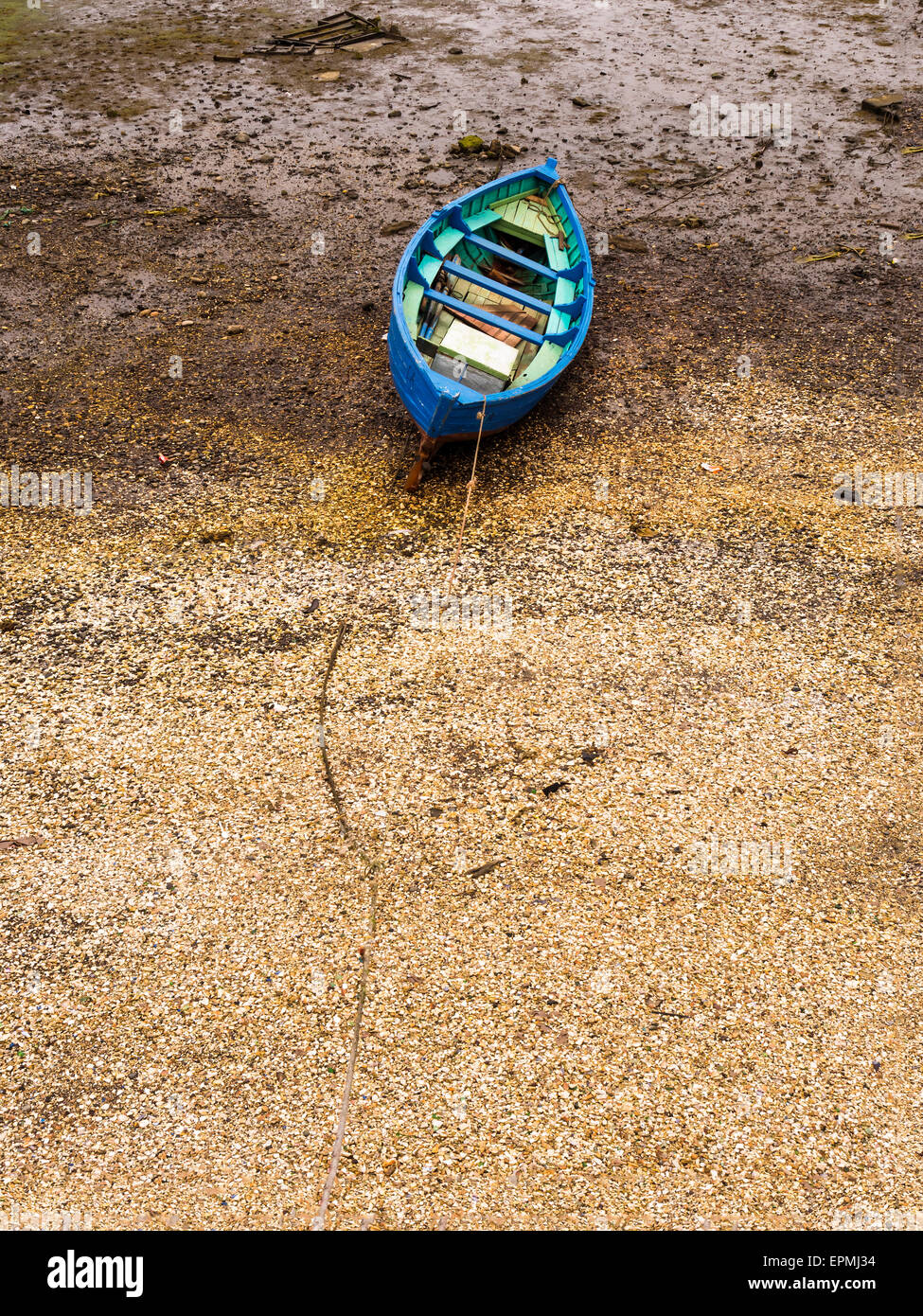 Chile, Puerto Montt, rowing boat lying on sand Stock Photo - Alamy