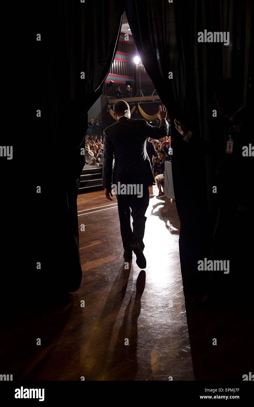 U.S. President Barack Obama waves as takes the stage for a town hall ...