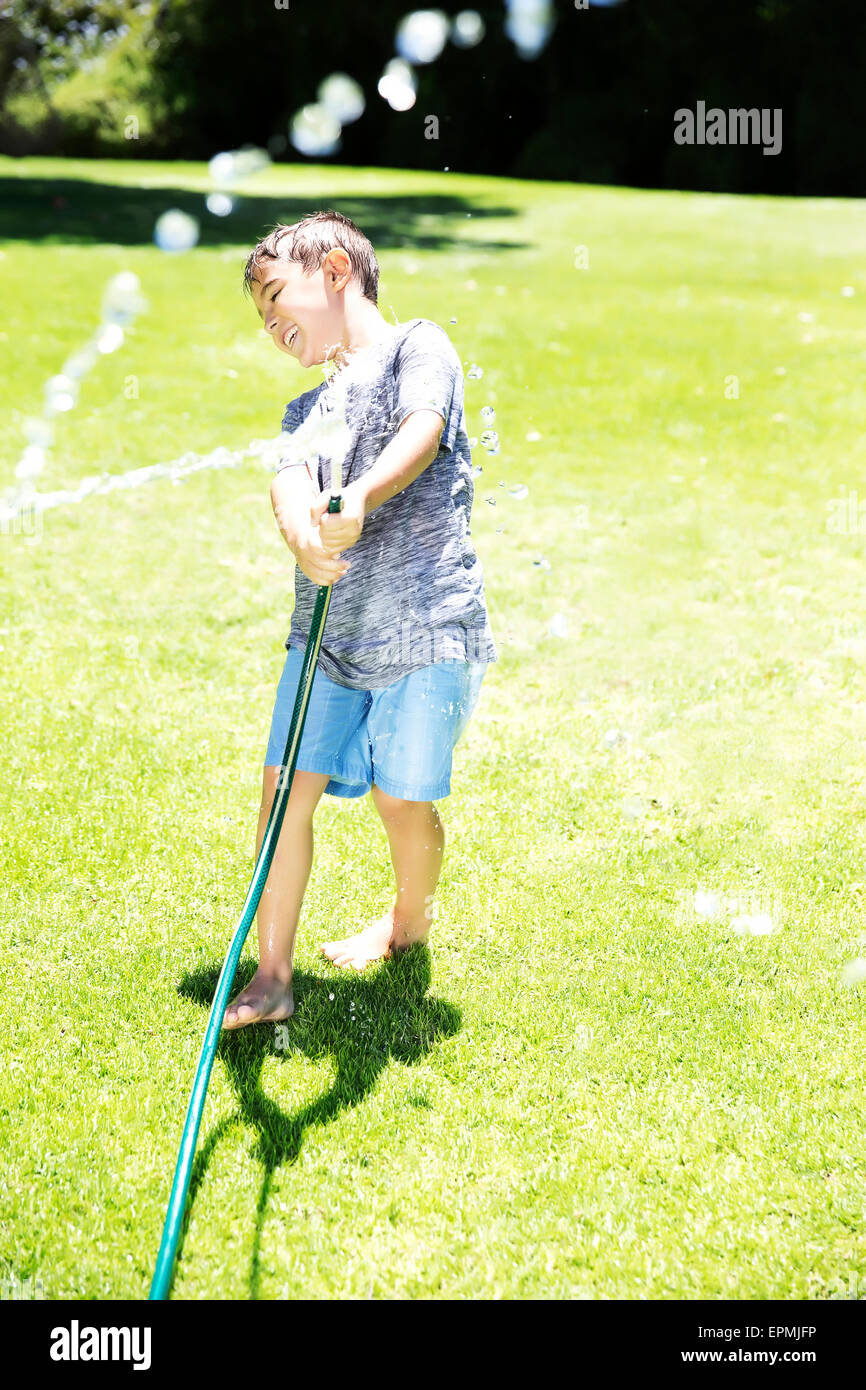 Outdoor summer day garden child wet hi-res stock photography and images - Alamy