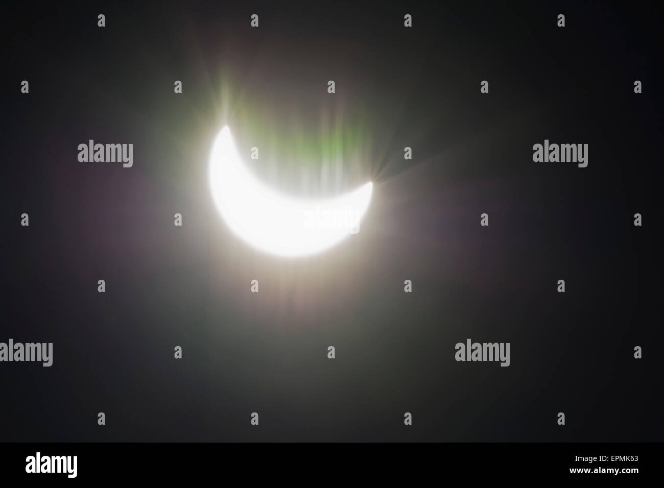 Partial solar eclipse Stock Photo - Alamy