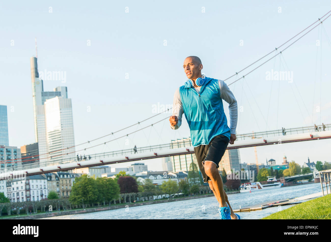 Germany, Frankfurt, man jogging by the riverside Stock Photo - Alamy