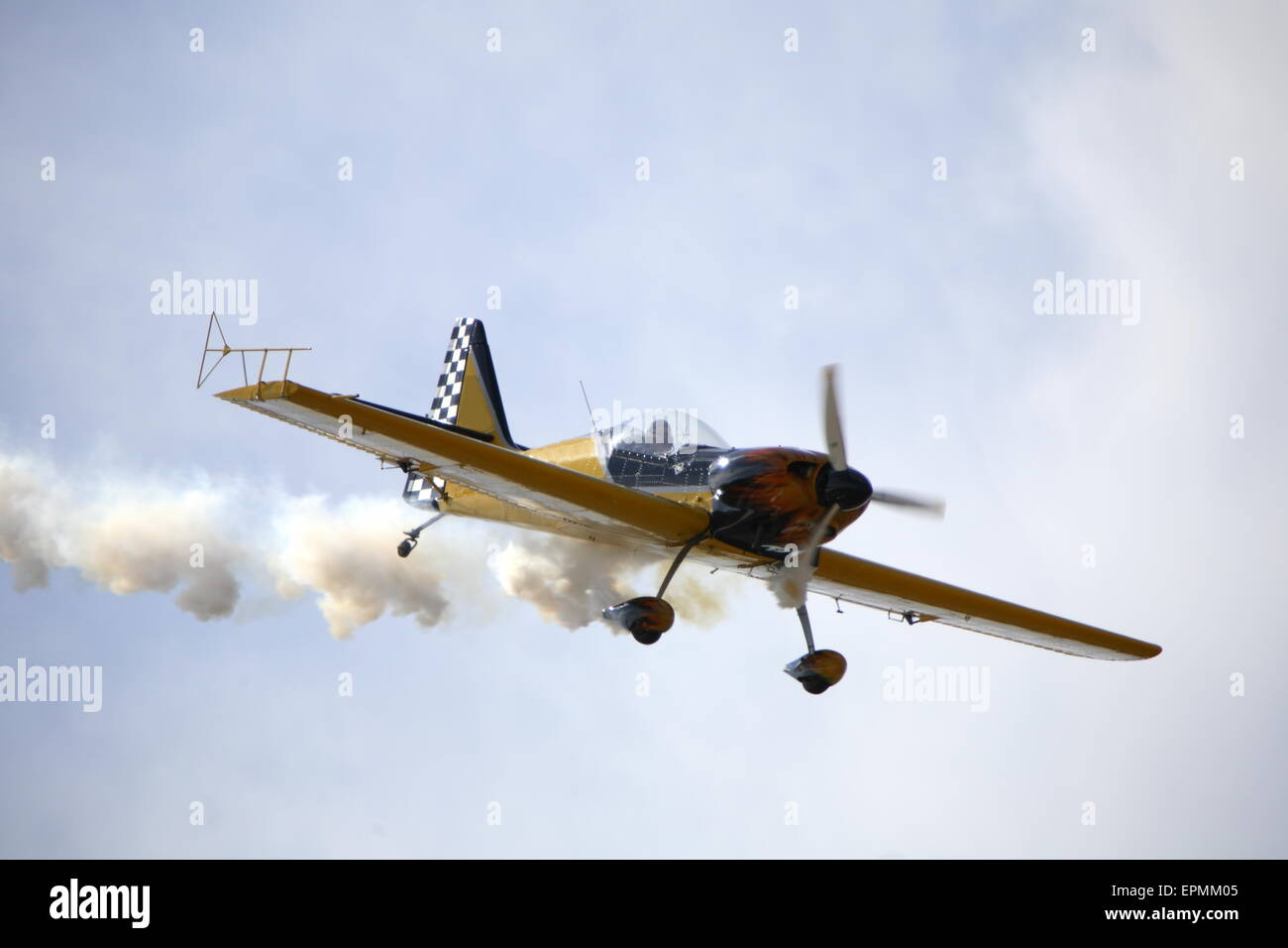Smoking aircraft flying at dusk in a dive Stock Photo - Alamy