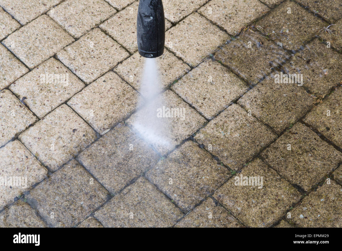 Outdoor floor cleaning with high pressure water jet Stock Photo - Alamy