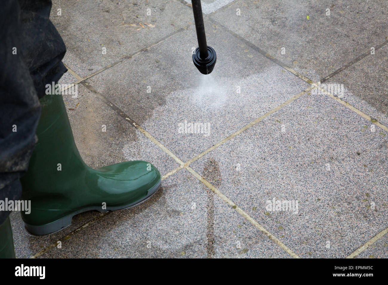 Outdoor floor cleaning with high pressure water jet Stock Photo - Alamy