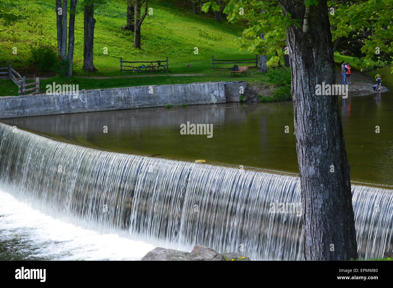 Water cascading over dam Stock Photo - Alamy