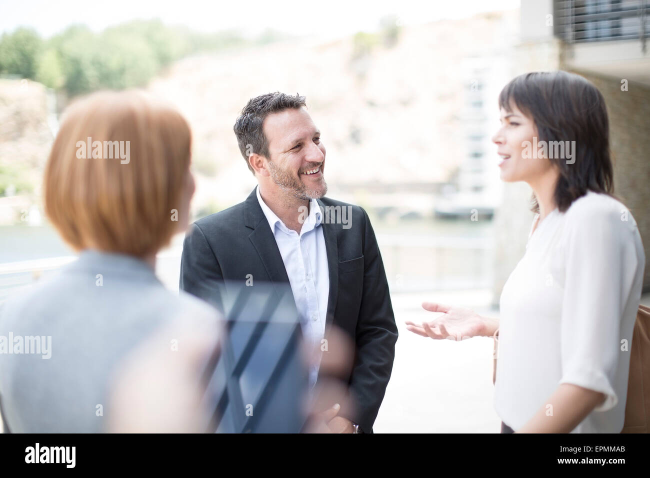 Business colleagues meeting outside the office Stock Photo - Alamy