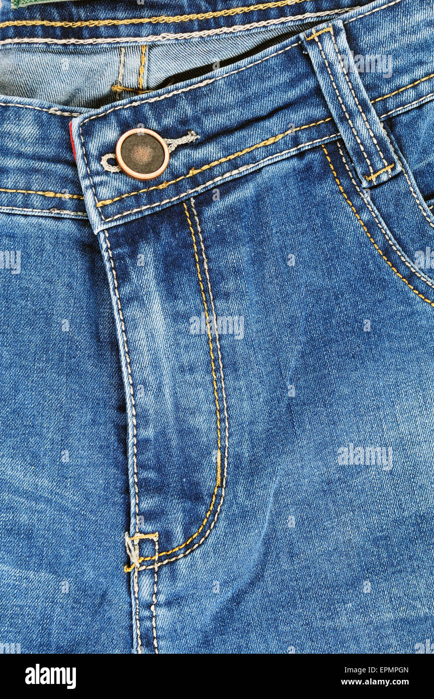 Detail of the closing of pants in jeans for men light blue color Stock ...