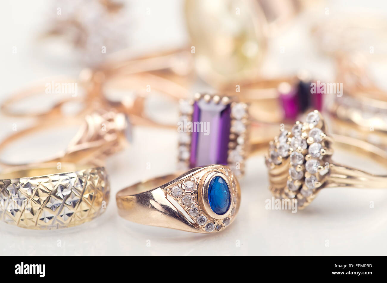 A collection of gold jewelry Stock Photo - Alamy