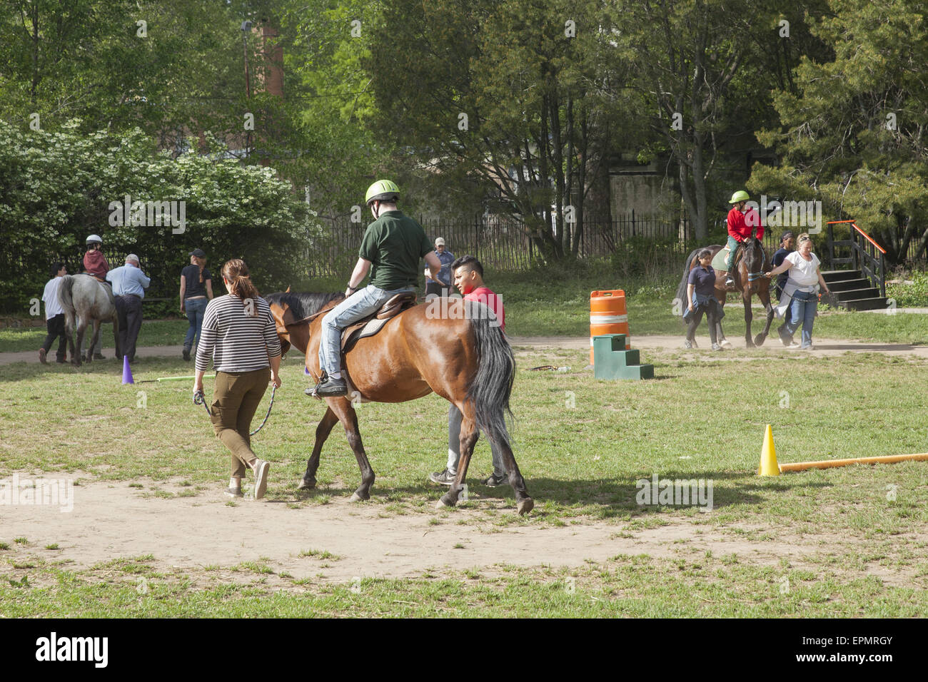 Disabled child riding horse hi-res stock photography and images - Alamy