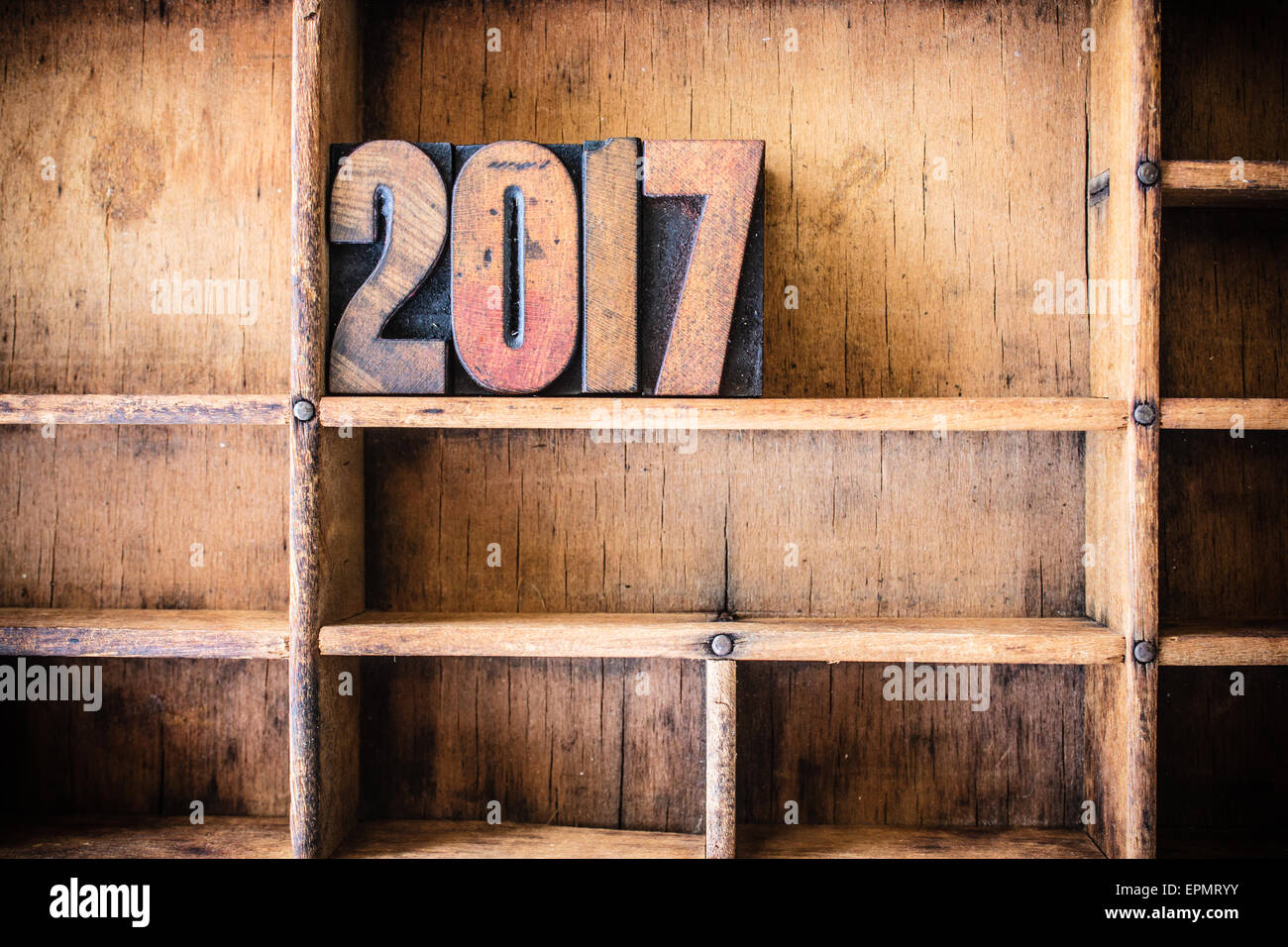 The word 2017 written in vintage wooden letterpress type in a wooden ...