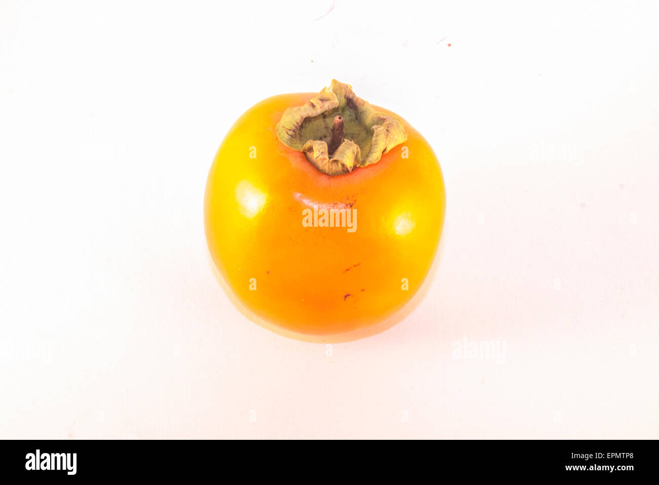 Orange persimon fruit, isolated on white background Stock Photo - Alamy