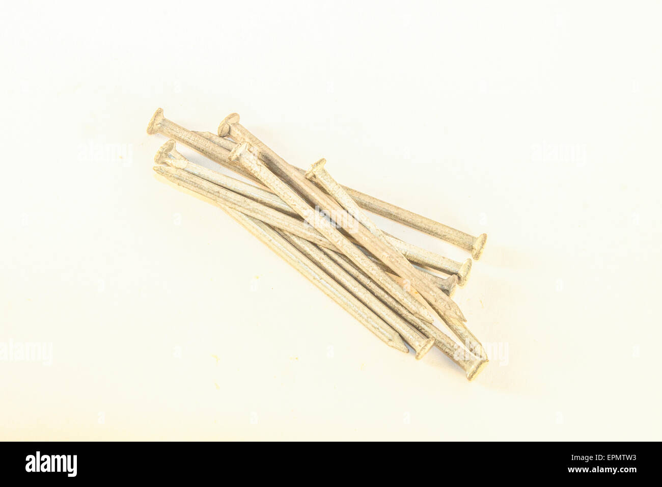 A lot of metal spikes,isolated on white background Stock Photo - Alamy