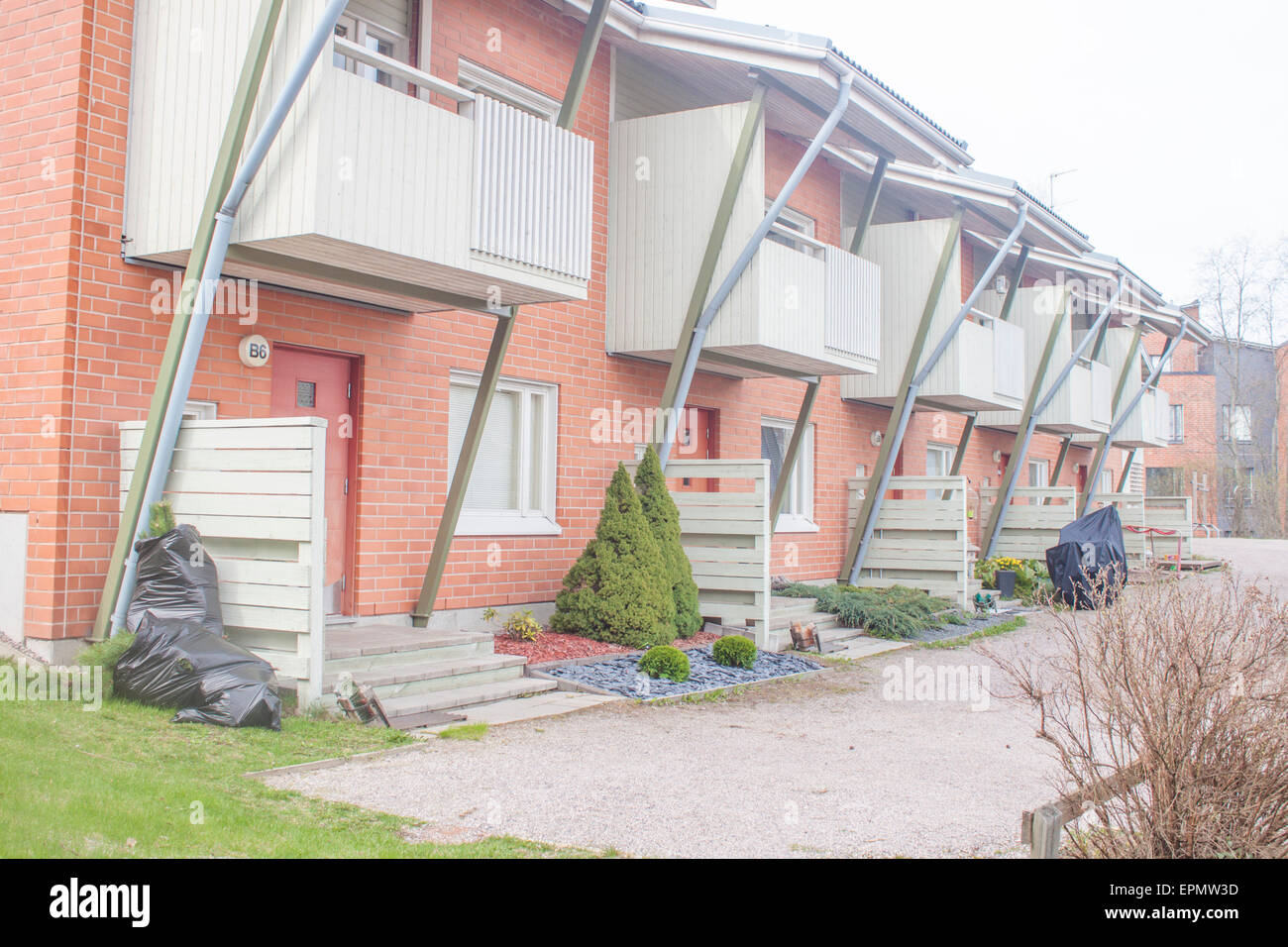 A row of red houses, near each other Stock Photo - Alamy