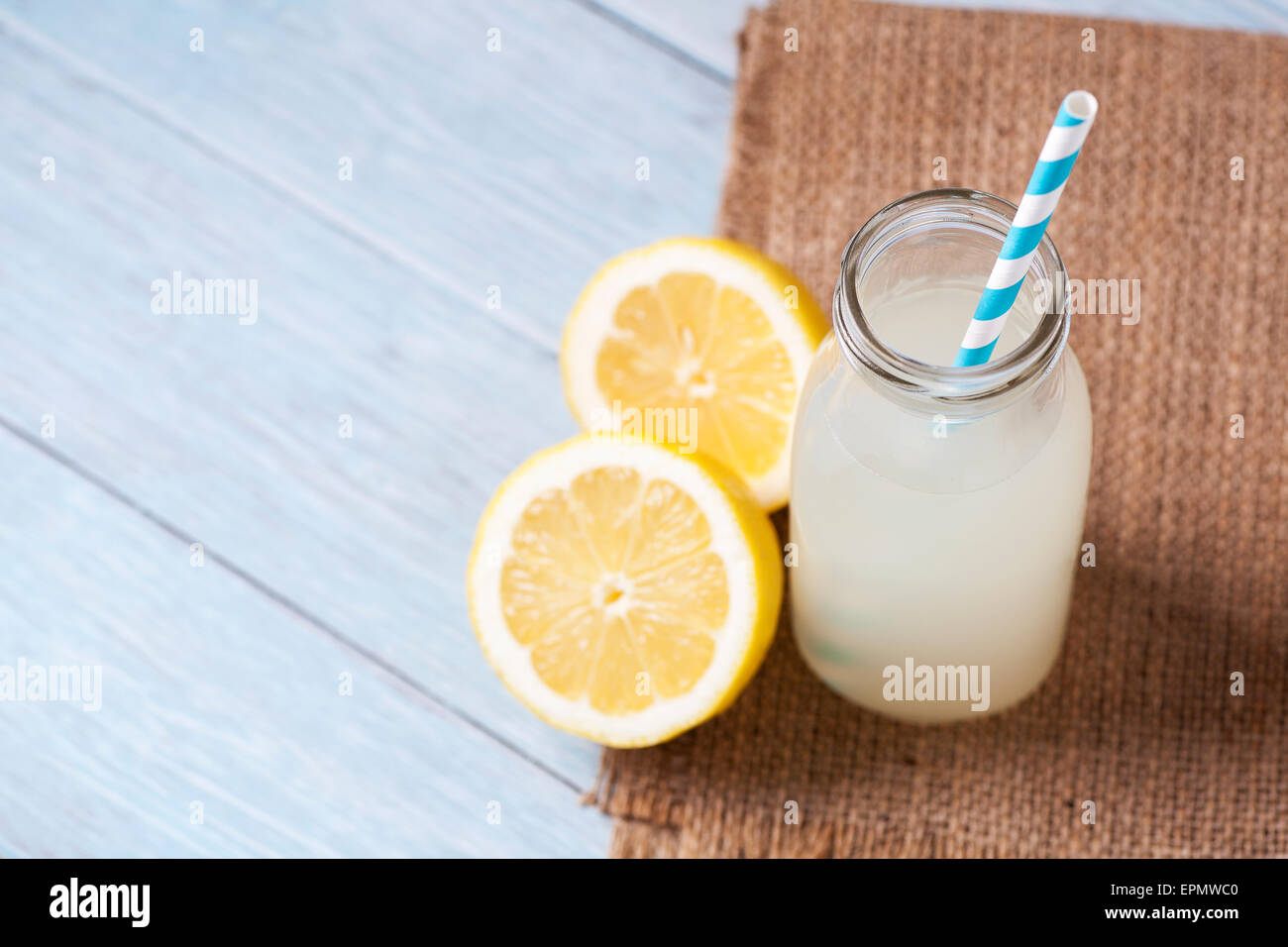 Traditional cloudy lemonade in glass bottles Stock Photo - Alamy