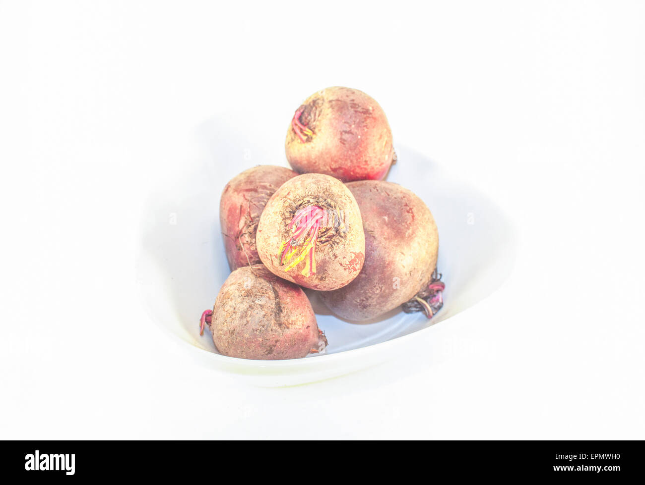 A bowl full of purple beetroot, isolated on white background Stock ...