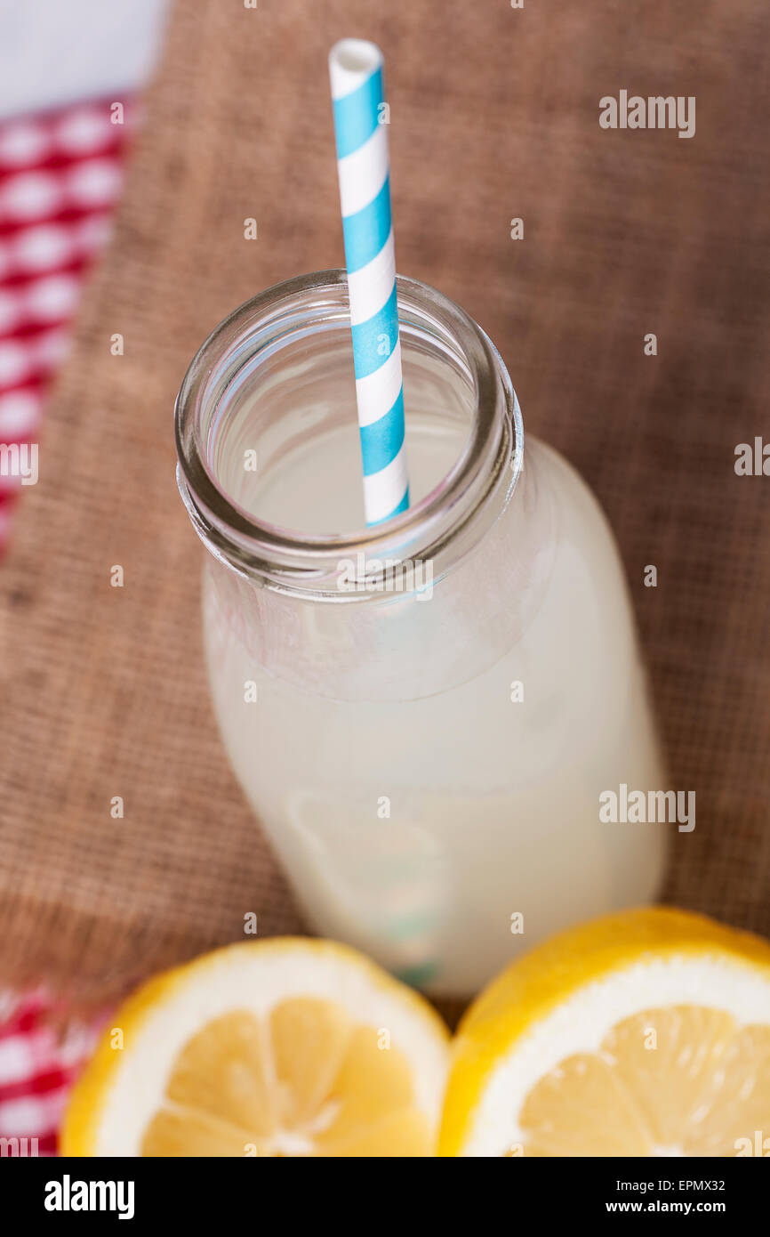 Traditional cloudy lemonade in glass bottles Stock Photo - Alamy