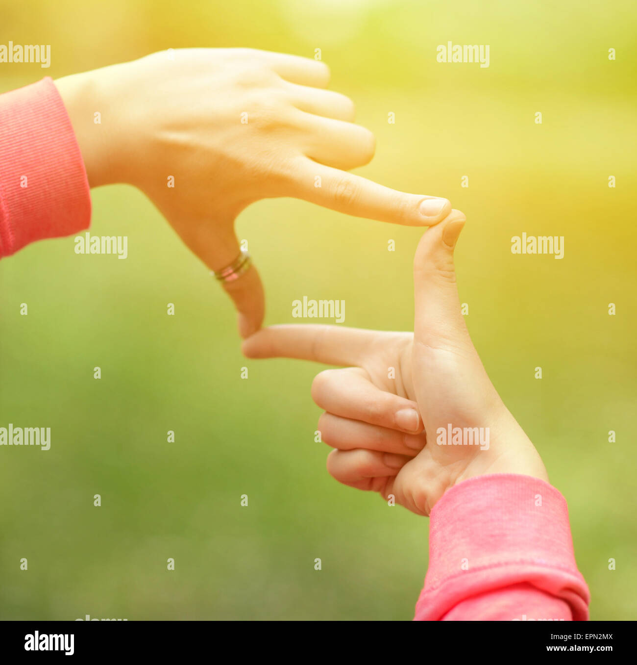 Close up of hands making frame gesture 2 SUN Stock Photo - Alamy