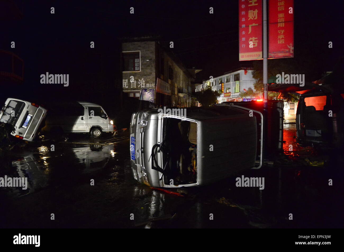 Nanchang, China's Jiangxi Province. 19th May, 2015. Overturned vehicles ...