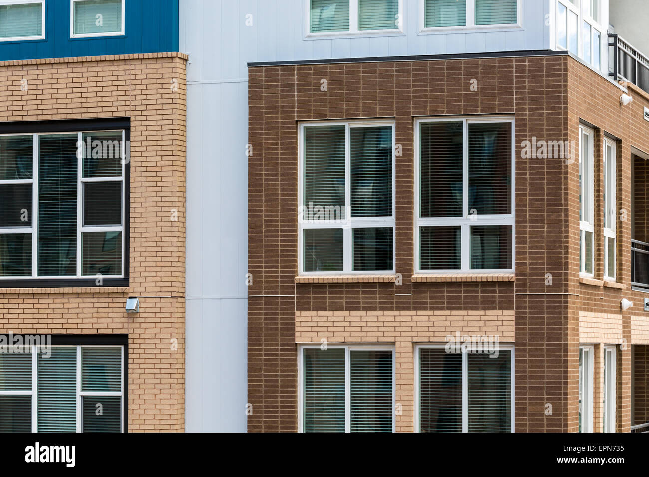 Elevation of modern condominiums in urban area Stock Photo - Alamy