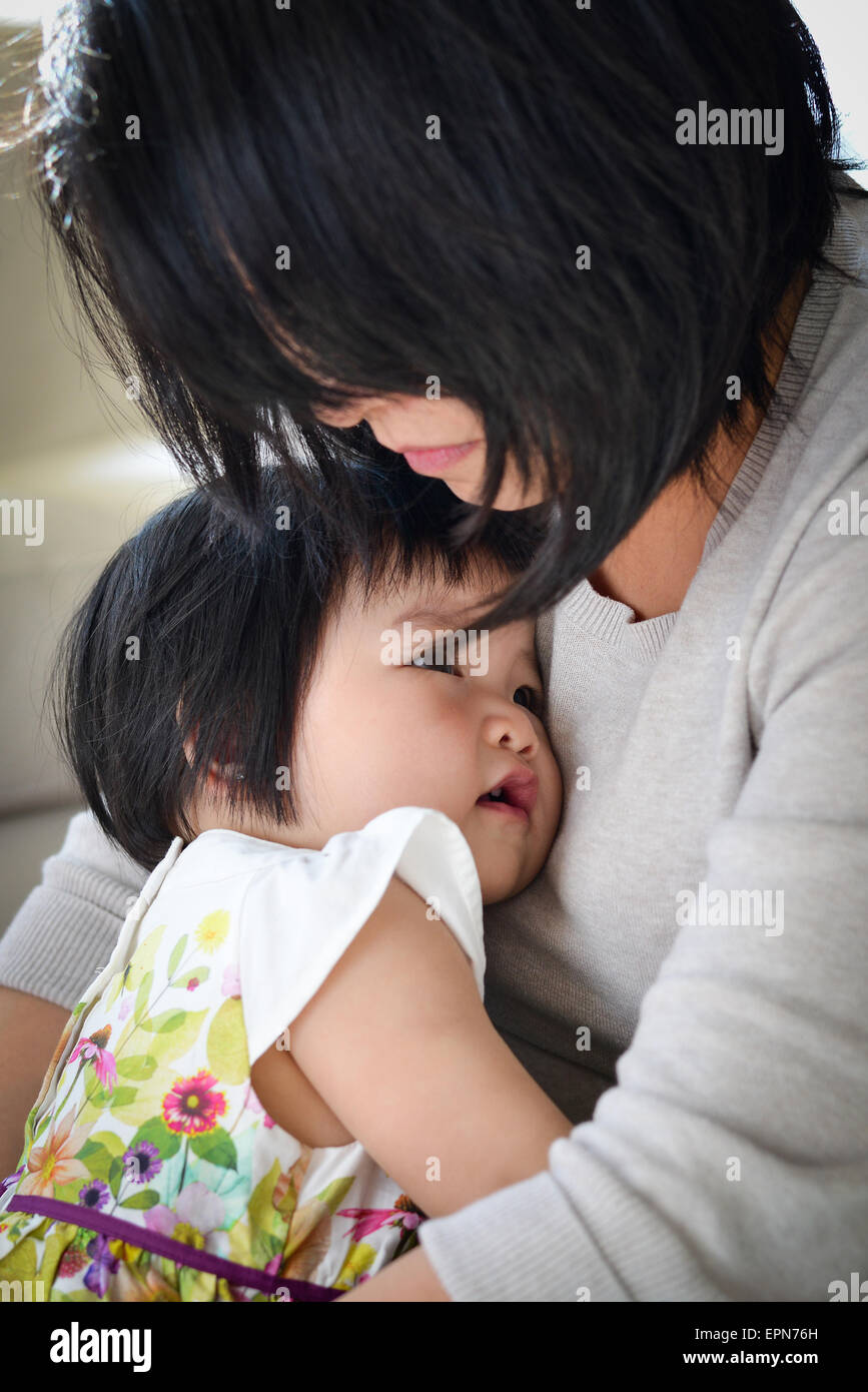 Precious Mother Daughter Moment Of Loving Embrace Stock Photo - Alamy
