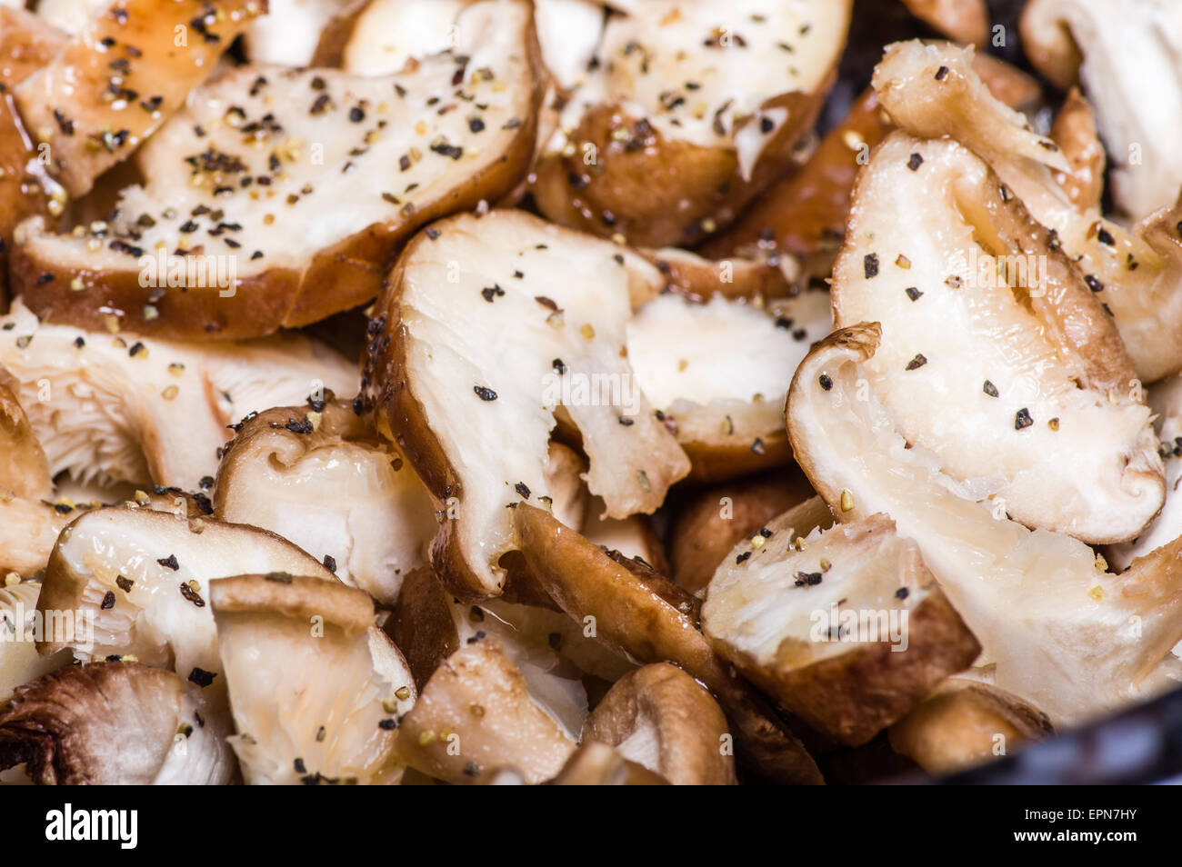 Seasoned sliced mushrooms ready to prepare for cooking Stock Photo - Alamy