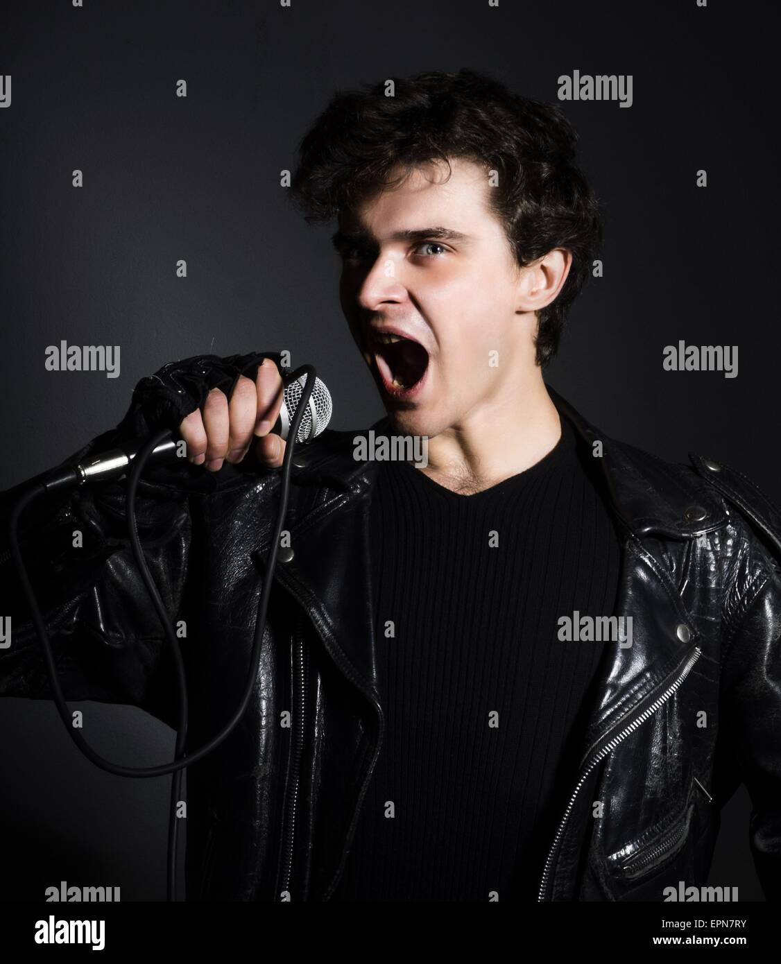 Feb. 21, 2014 - Rock singer screaming on the microphone © Igor ...