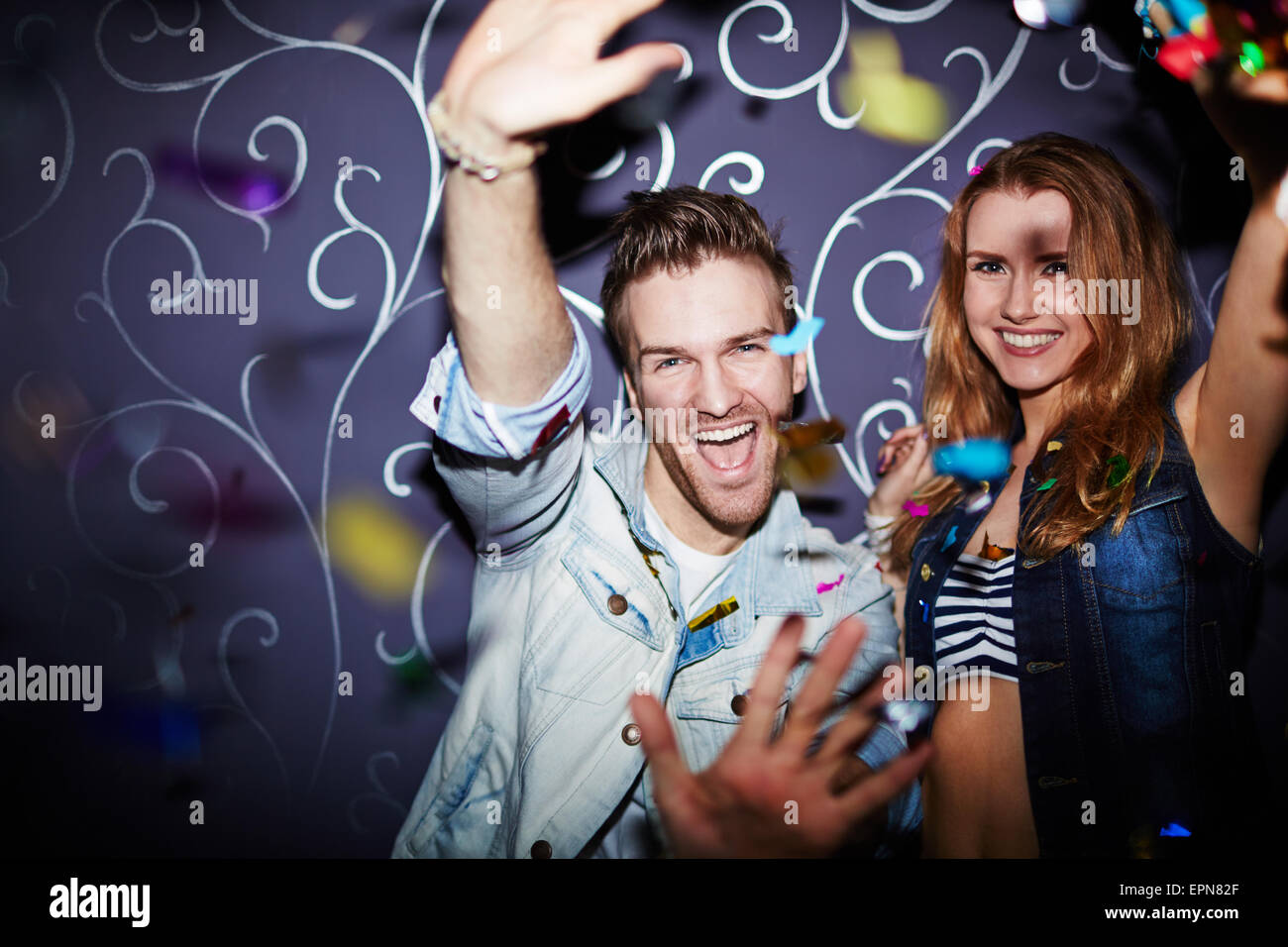 Ecstatic couple having fun at party Stock Photo - Alamy