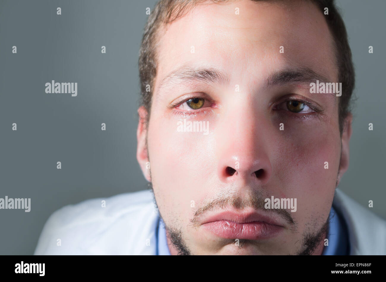 Closeup portrait of sad young doctor crying Stock Photo - Alamy