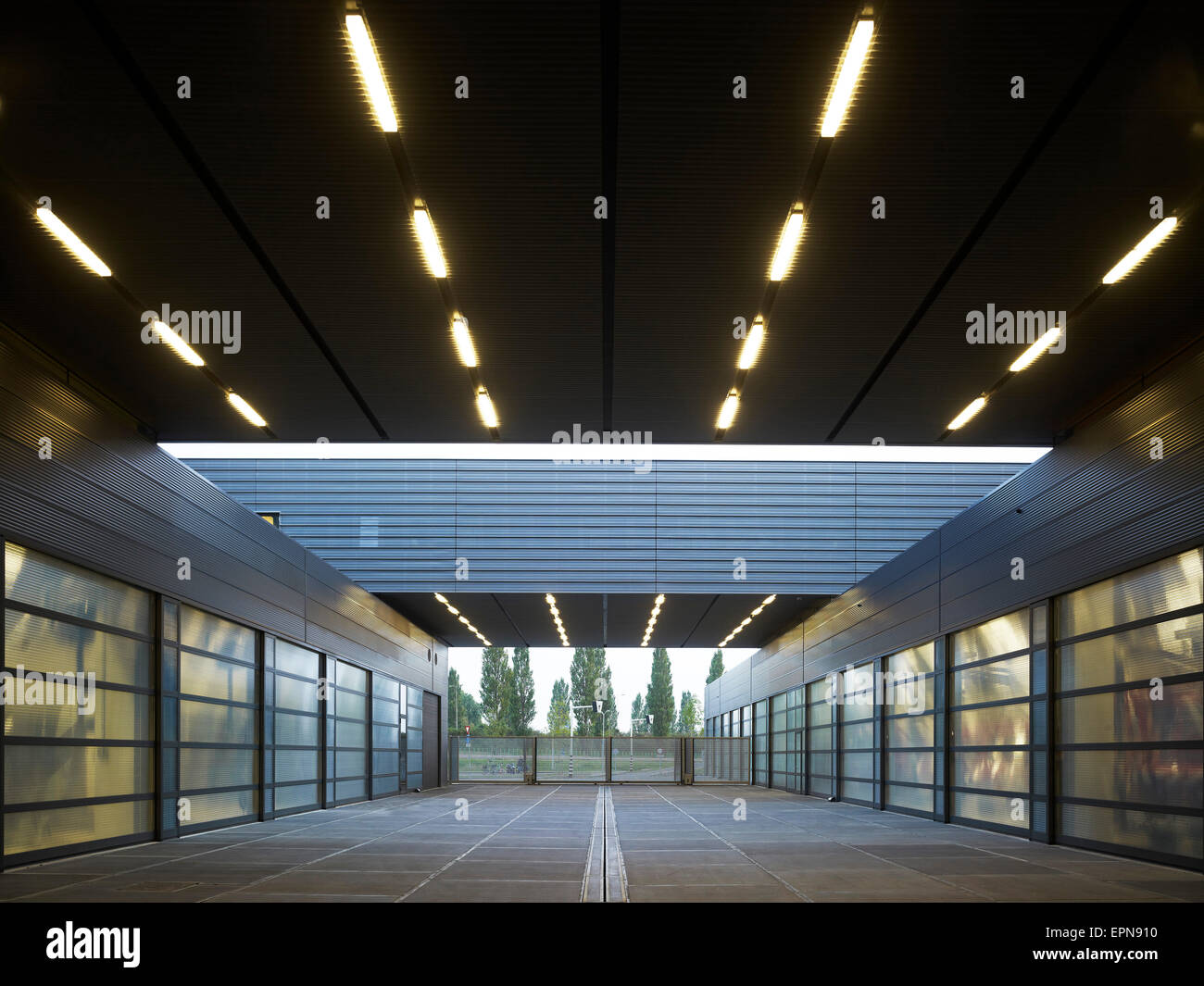 Canopied parking space with fire engine garage to both sides. Fire ...