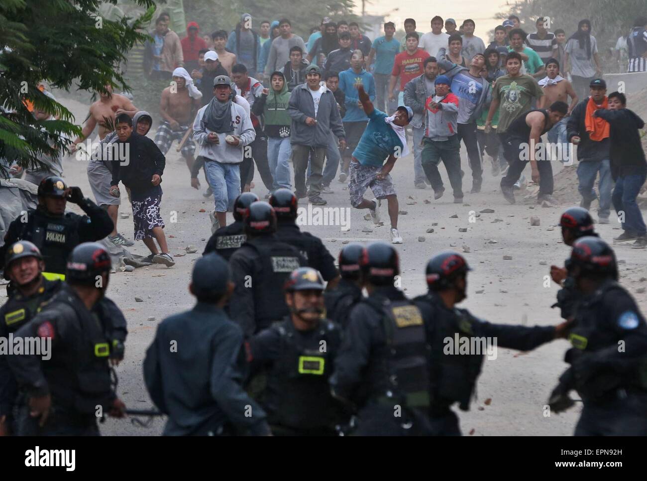Lima, Peru. 19th May, 2015. People who invade an archaeological zone ...