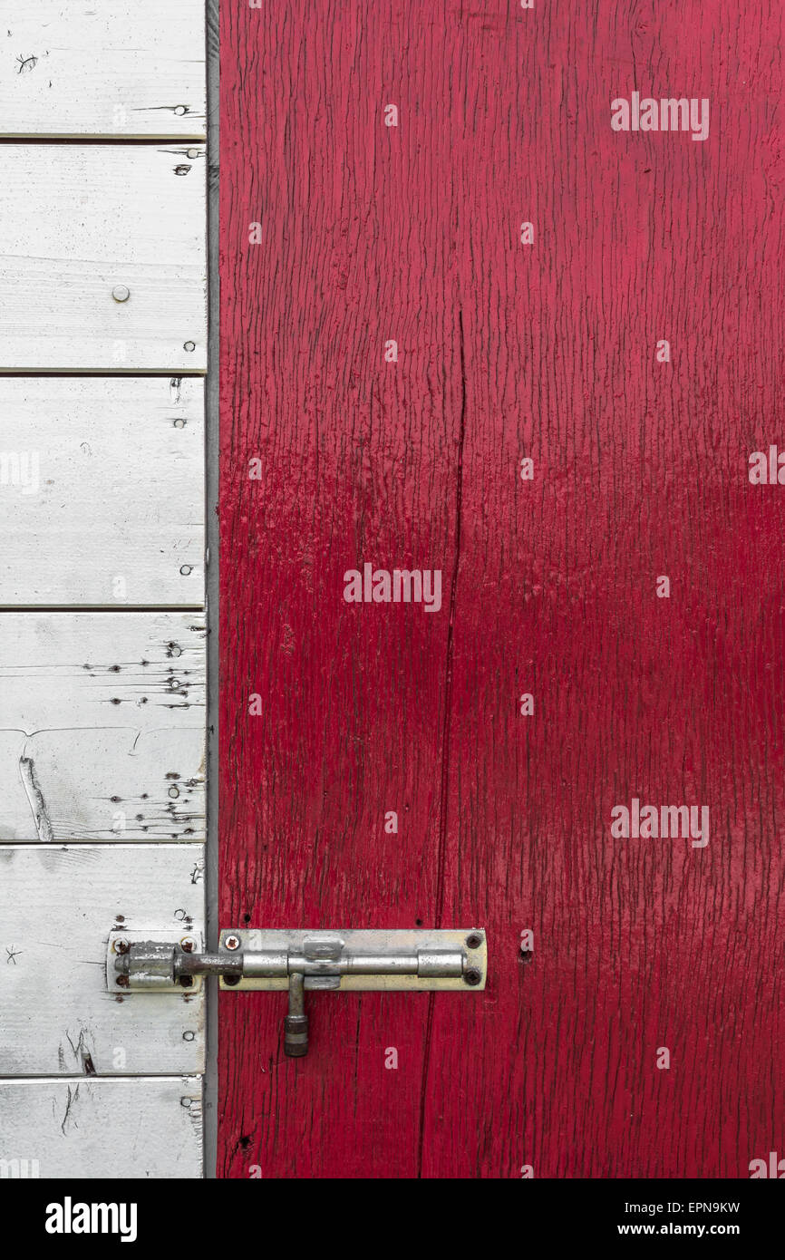 Front view of a latch installed on an old wooden door Stock Photo - Alamy