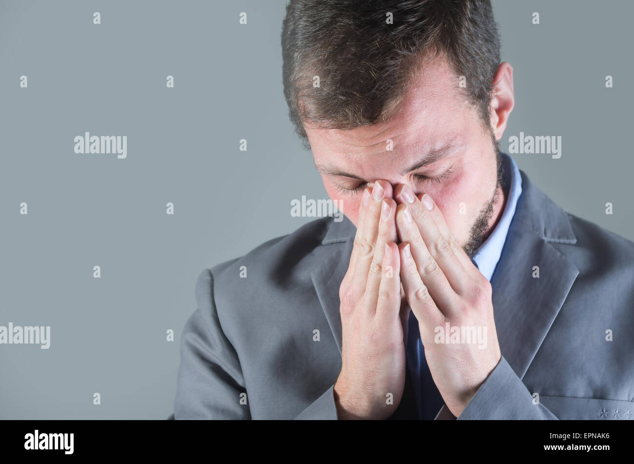 Young handsome desperate man Stock Photo - Alamy