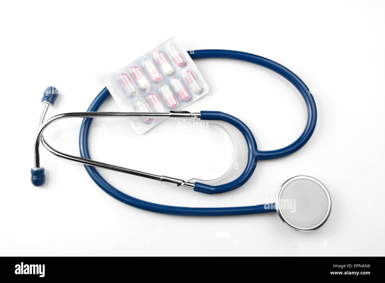 Medications on the table for treating patients on the white background ...